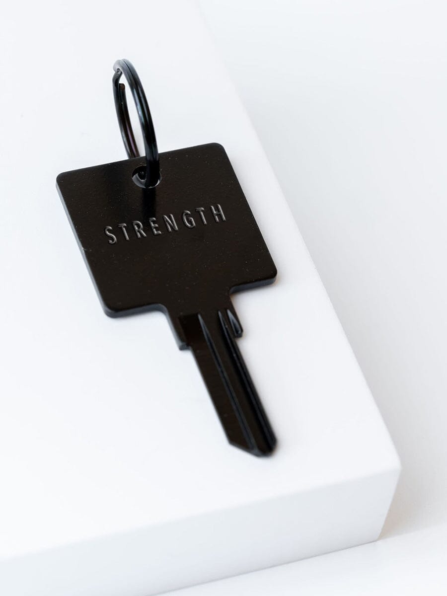 Matte Black Keychain with Custom Engraved Word | The Giving Keys