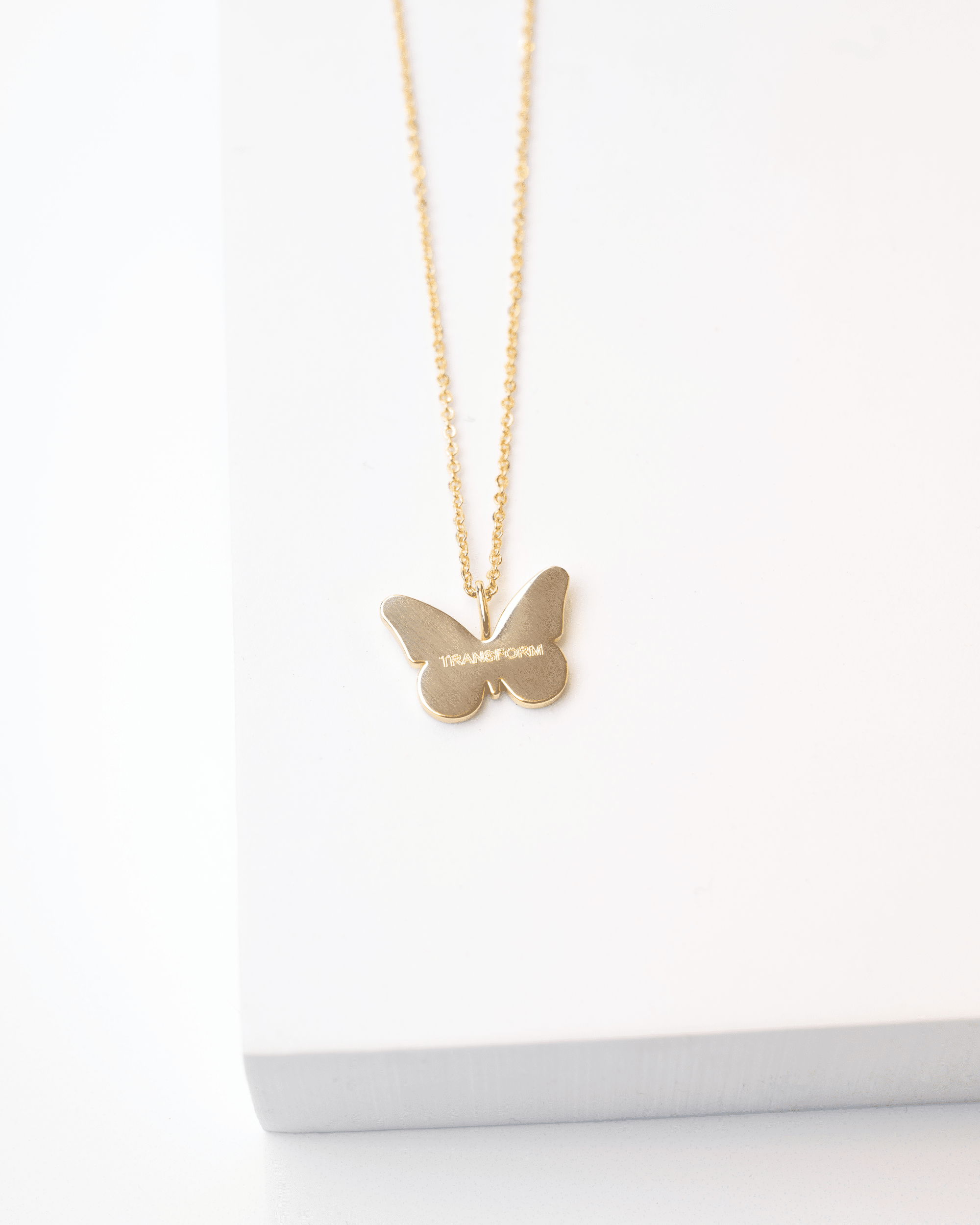 Butterfly Transform Necklace with Engraved Word | The Giving Keys