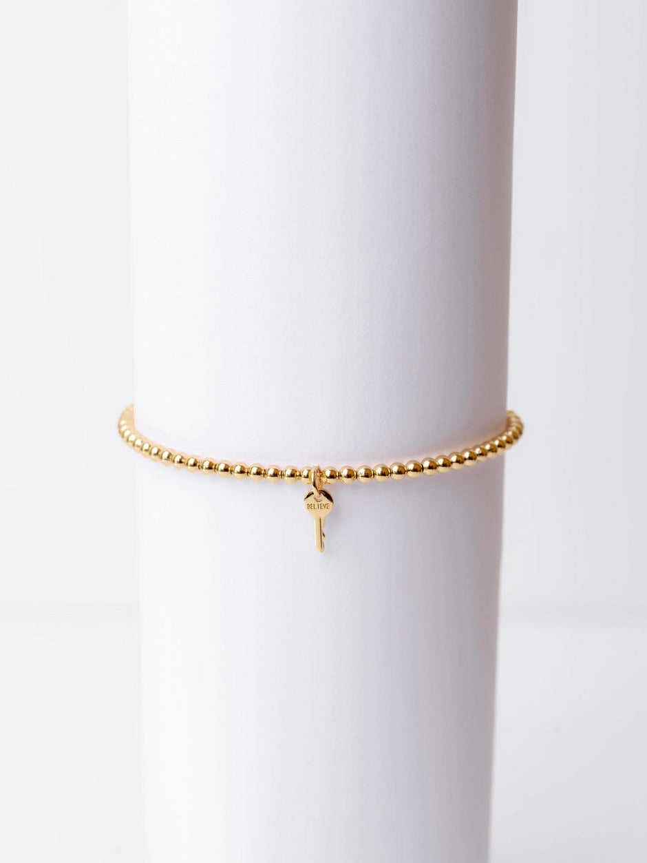 Shop Engraved Word Key Bracelet Collection | The Giving Keys